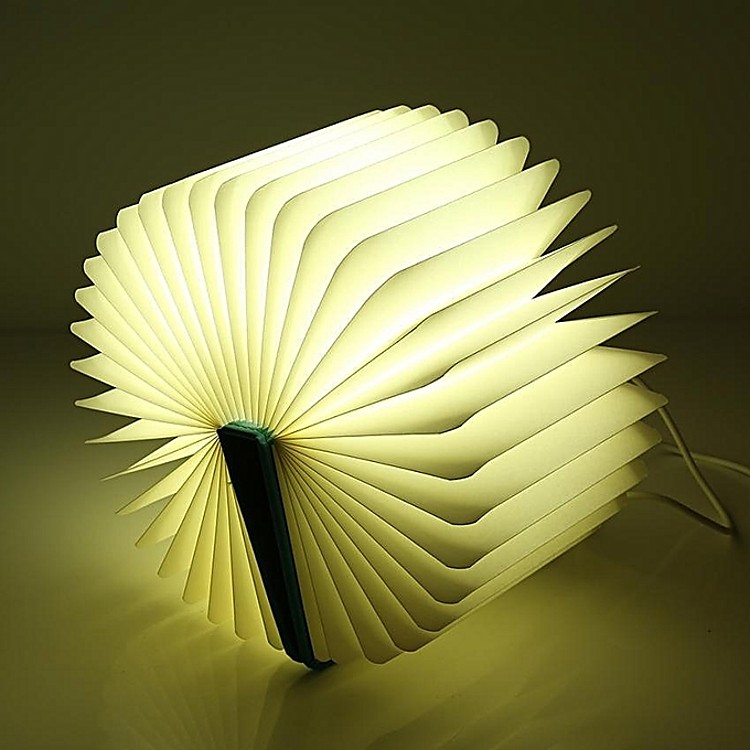 Lámpara con forma de libro que se ilumina al abrirse